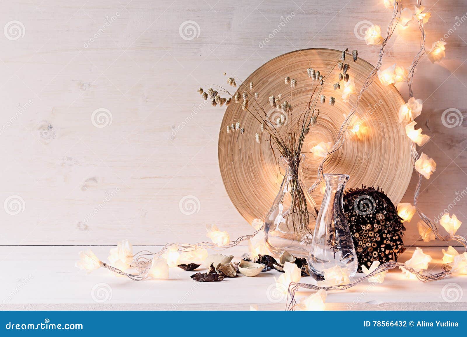Soft Home Decor with Burning Lights on White Wooden Background. Stock ...