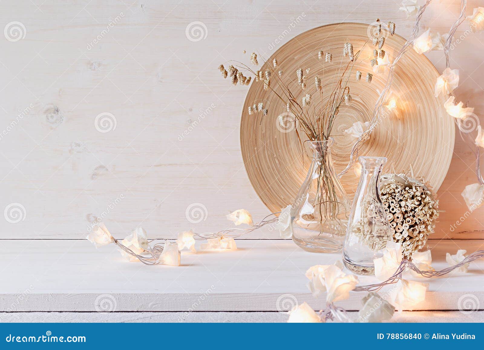 Soft Home Decor with Burning Lights on White Wooden Background. Stock ...