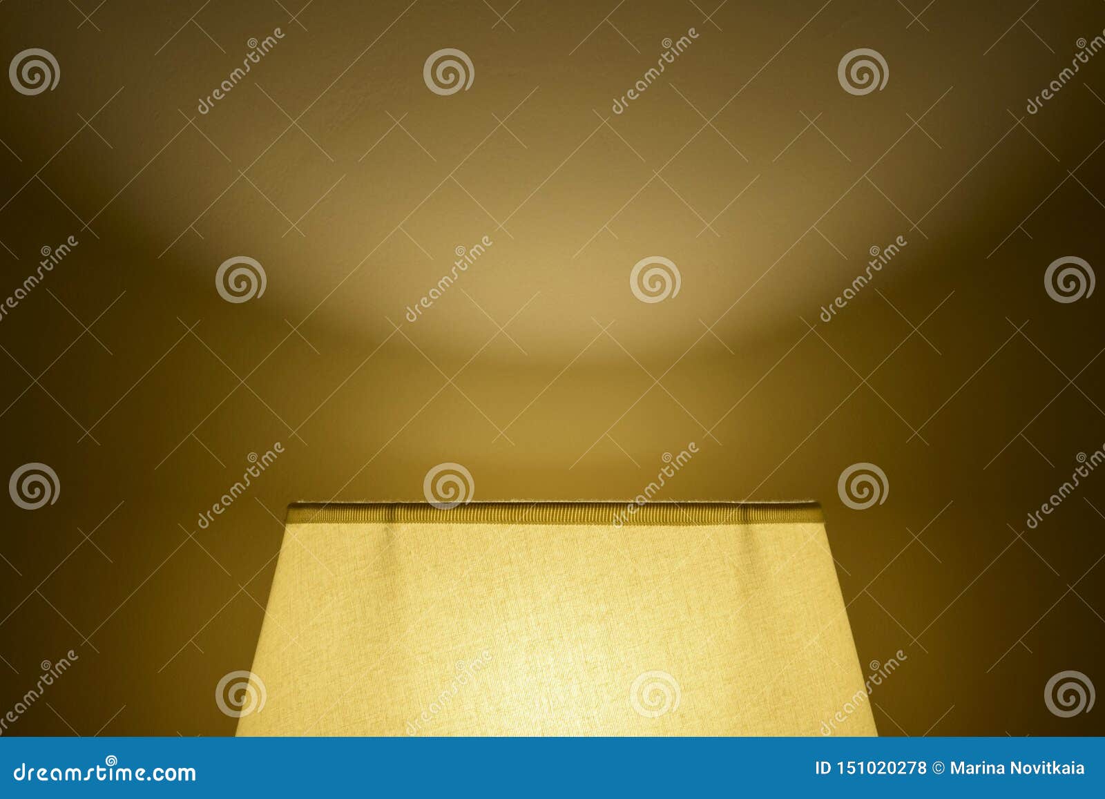Soft Light from a Lamp Shade on the Wall in a Dark Room. Backlight from ...