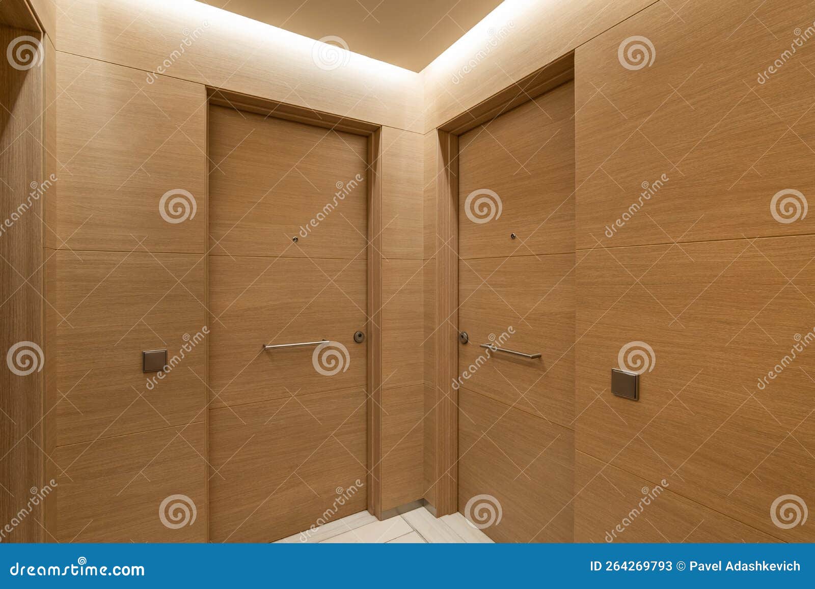 Soft Light from Niche Under Ceiling Illuminates Doors and Walls in ...