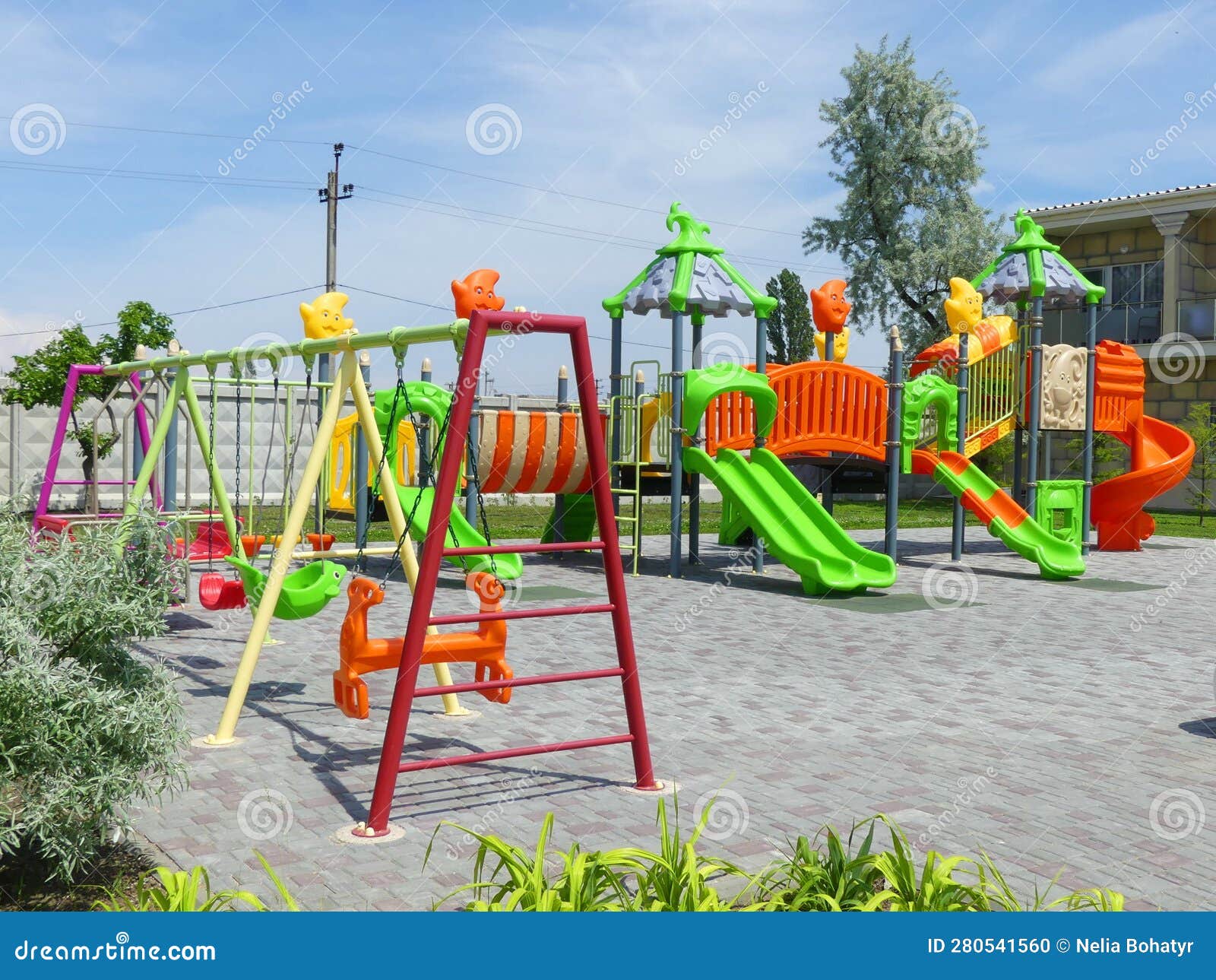 Soft Play Area.Swing Carousel in the Park for Children Stock Photo ...