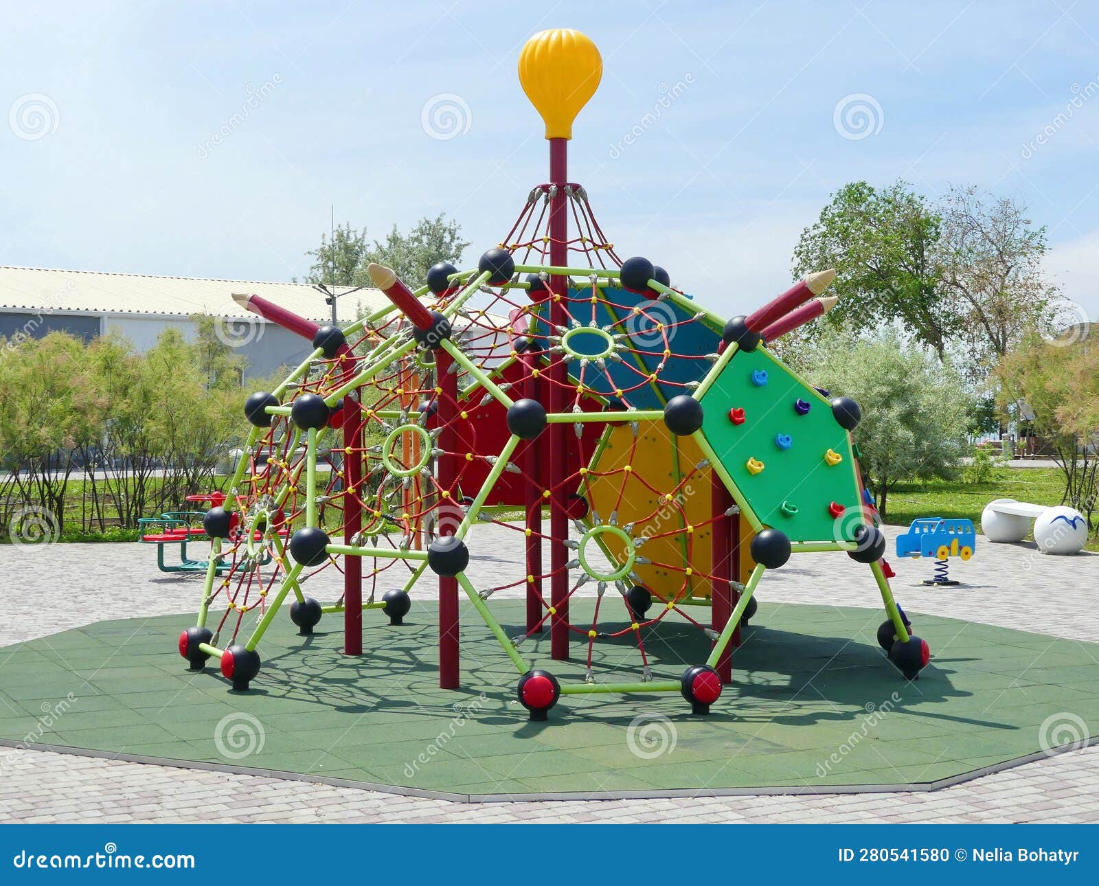 Soft Play Area.Swing Carousel in the Park for Children Stock Photo ...