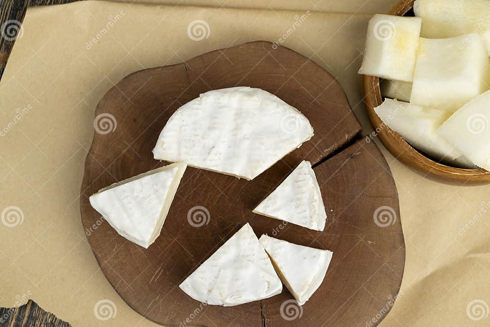Soft Processed Cheese on a Board and Paper Stock Image - Image of ...