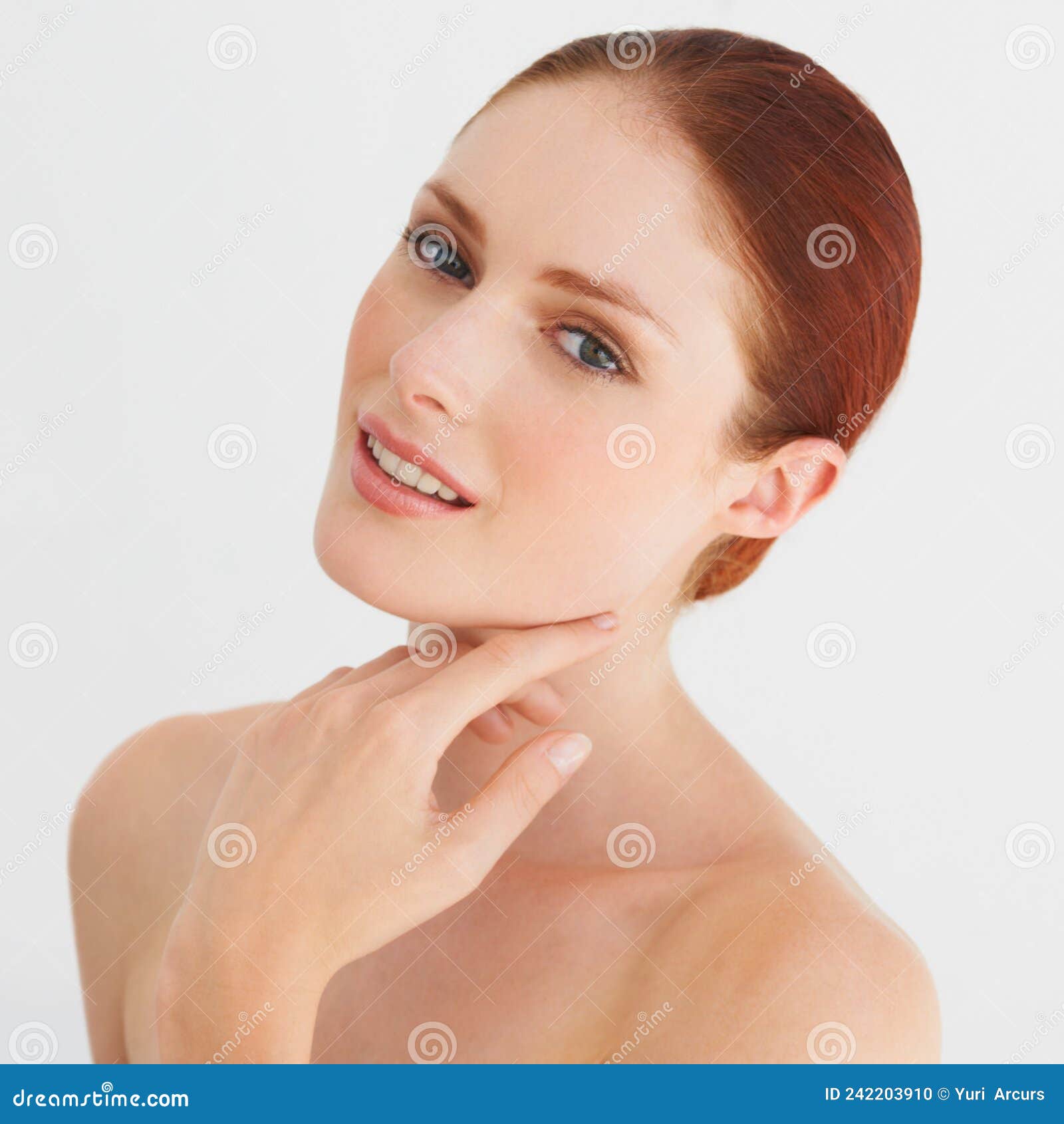 Soft To The Touch Portrait Of A Beautiful Woman Touching Her Face
