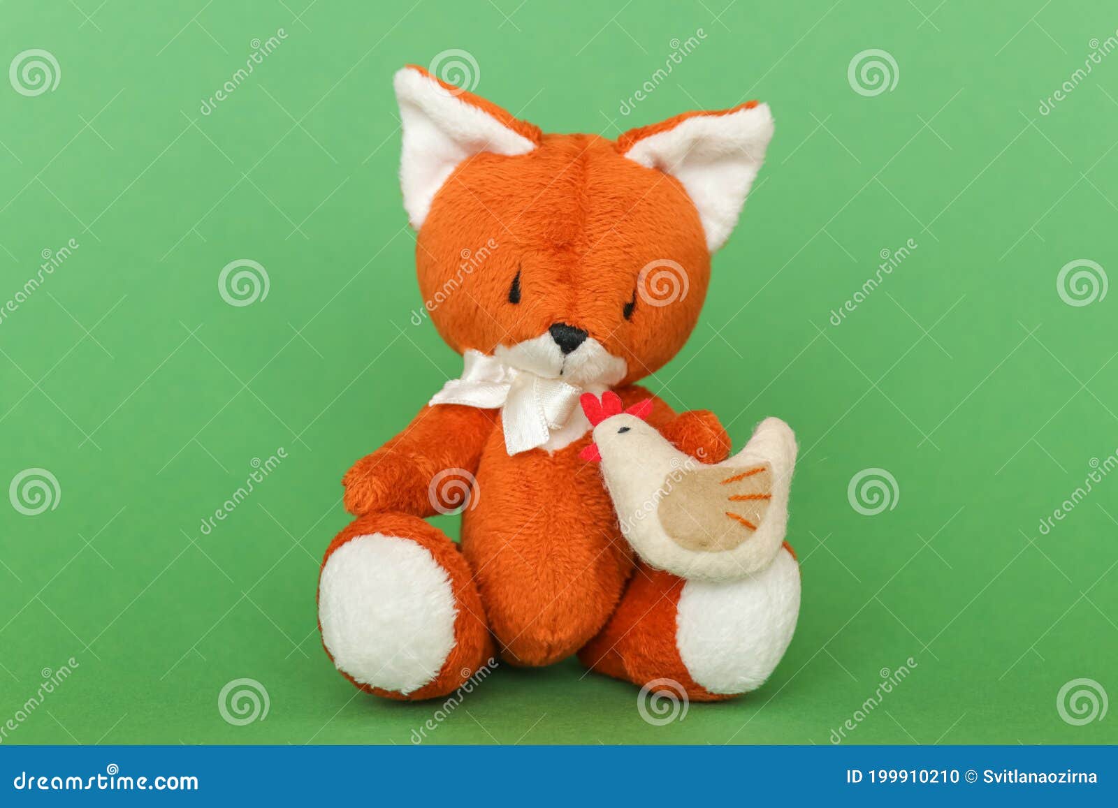 Soft Toy Ginger Fox with Chicken on a Green Background Stock Photo ...