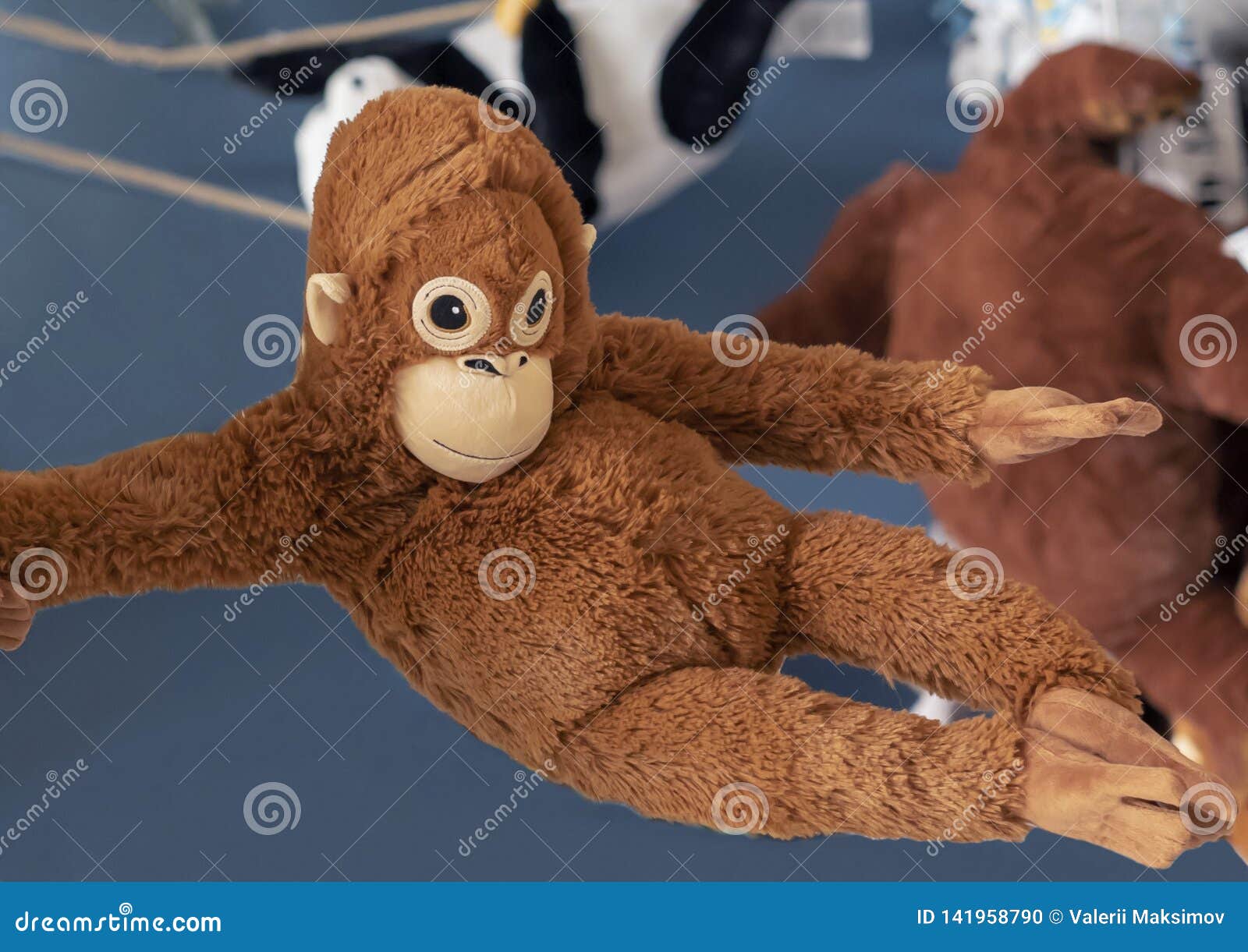 Soft Toy Orange Monkey in the Toy Store Stock Photo - Image of teddy ...