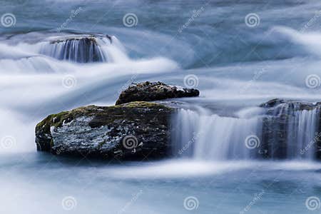 Soft Water Over Stones in Blue River Stream Stock Image - Image of ...