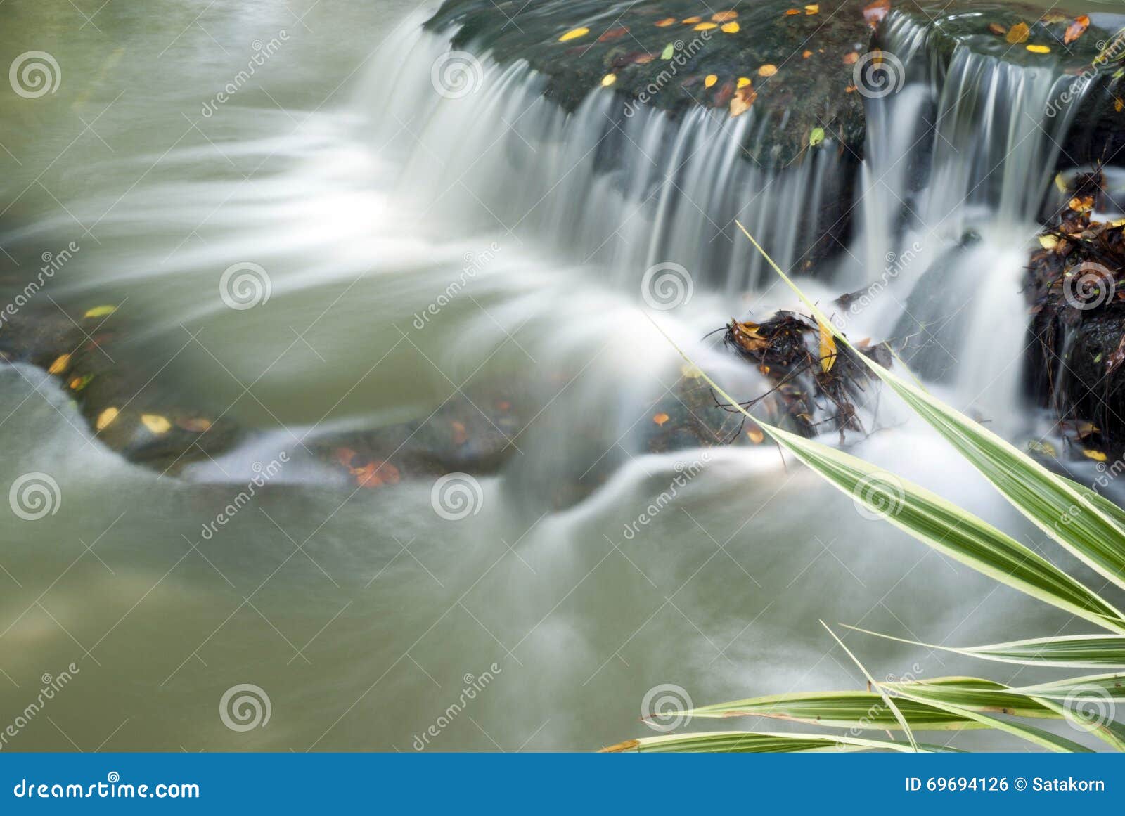 Soft Waterfall Cascades Stock Photo | CartoonDealer.com #76258068