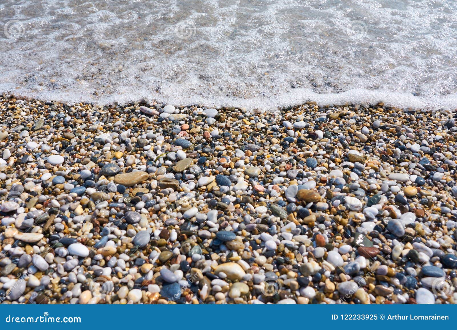 Soft wave on pebble beach. stock image. Image of outdoor - 122233925