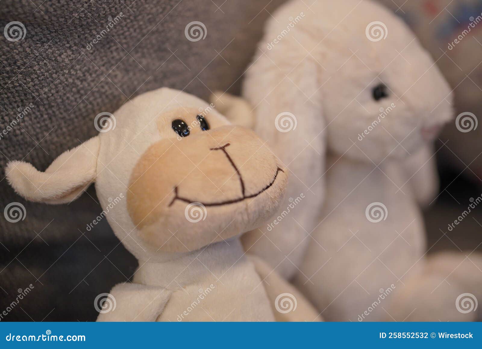 Soft White Plush Sheep Sitting on a Couch. Editorial Photography ...