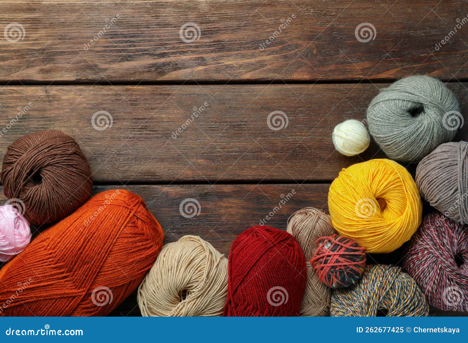 Soft Woolen Yarns on Wooden Table, Flat Lay. Space for Text Stock Image ...