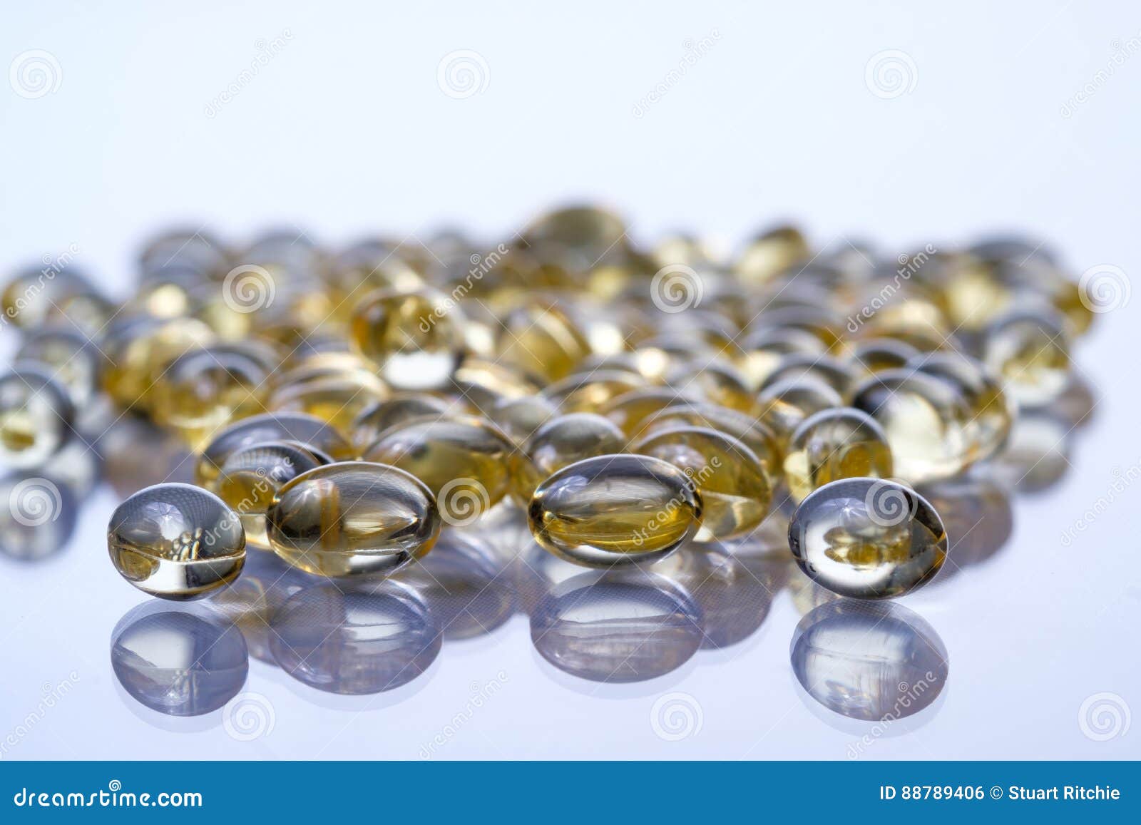 Softgel Capsules On Reflective Surface Royalty-Free Stock Image ...