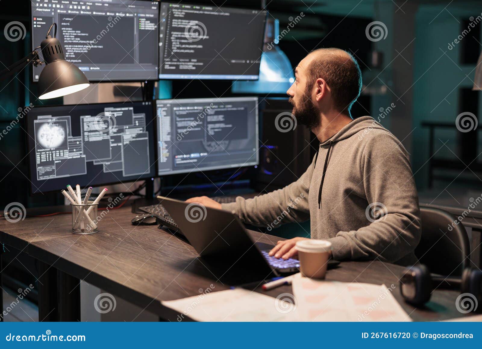 Software Developer Coding Database on Multiple Monitors Stock Photo ...