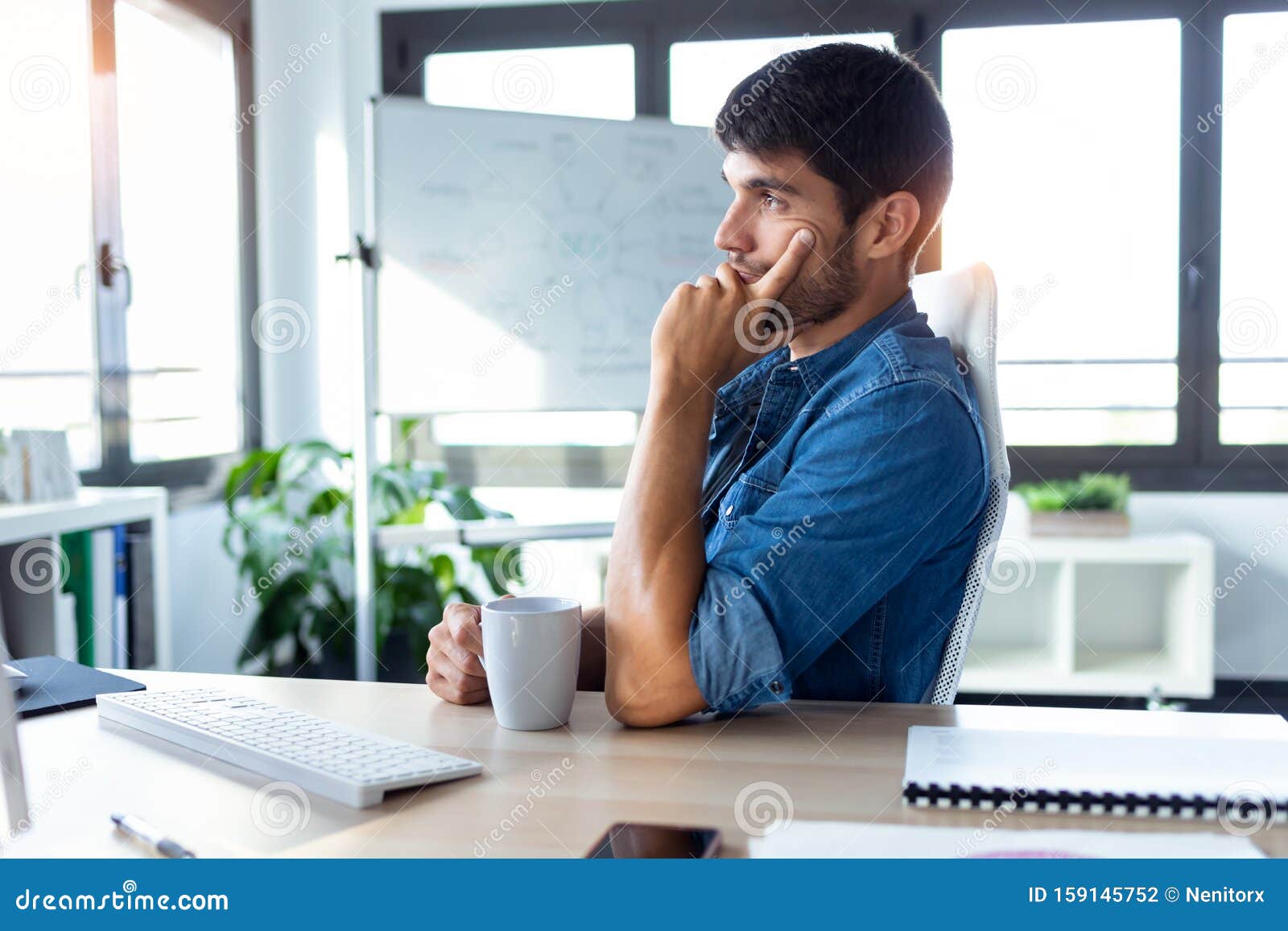 Software Developer Thinking in New Project while Working with Computer ...