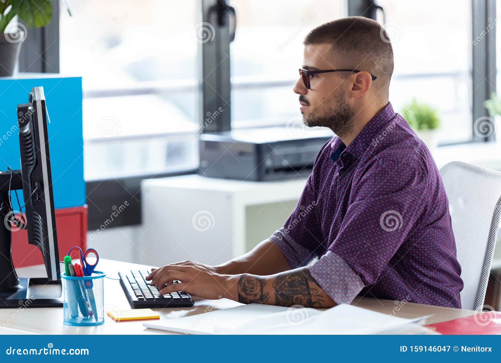 Software Developer Working with Computer in the Modern Startup Office ...