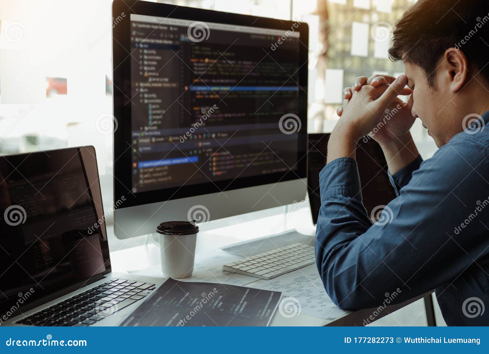 Software Developers Headache with Code Analysis in the Office Stock ...