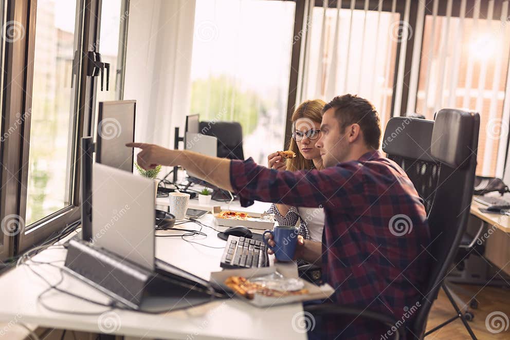 Software Developers on a Lunch Break Stock Image - Image of laptop ...