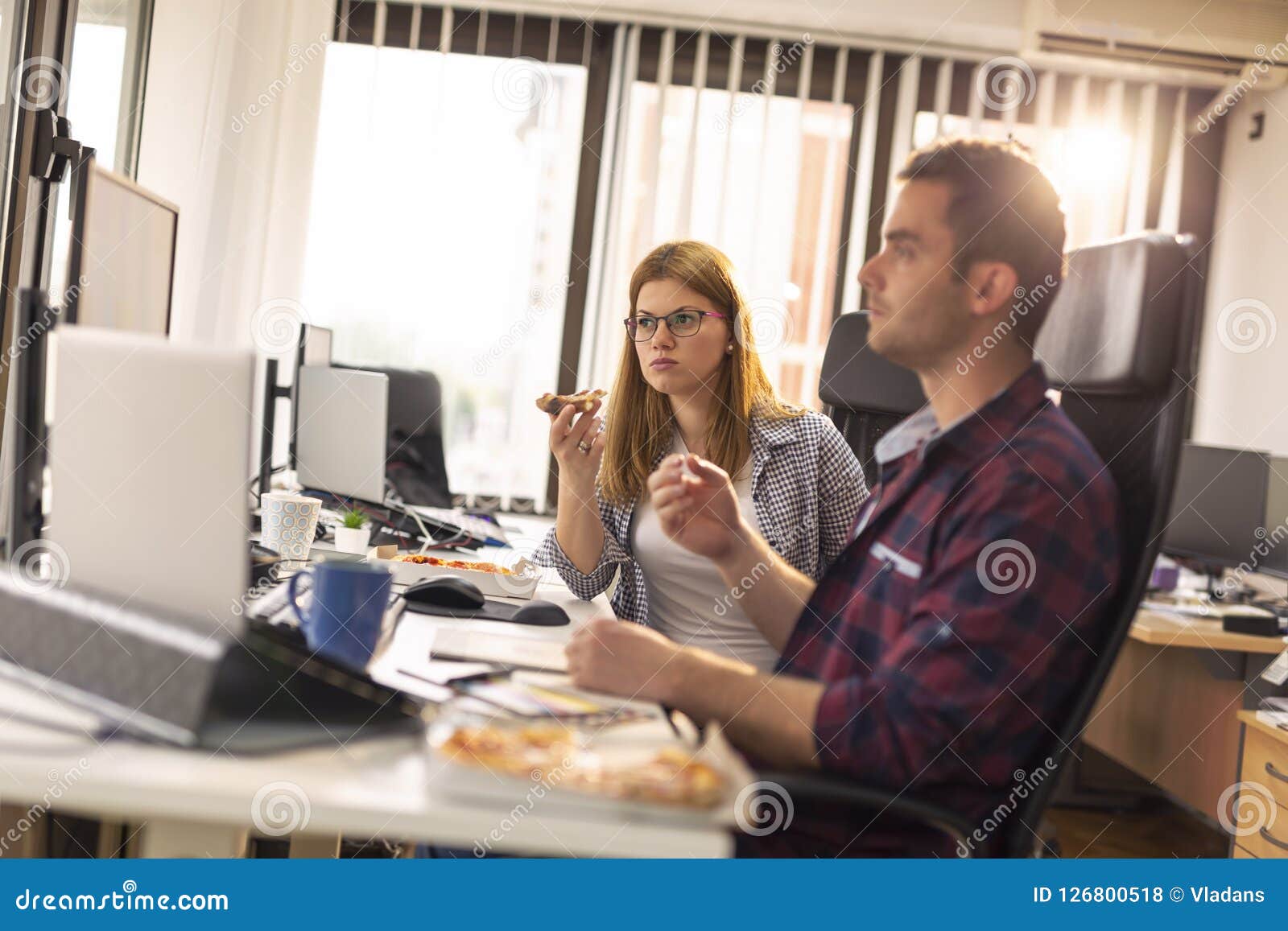 Software Developers Taking a Lunch Break Stock Photo - Image of code ...
