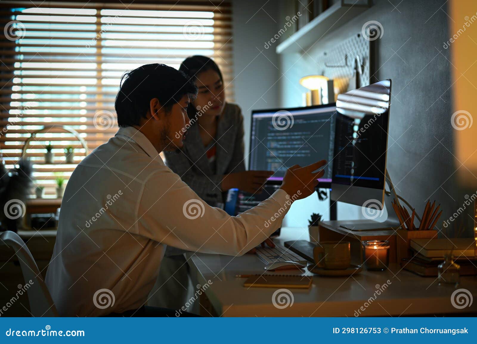 It Software Developers Team Brainstorming And Programming On Desktop