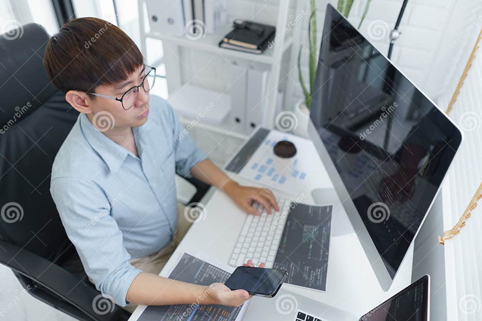 Software Development Concept, Male Programmer Check Website Programming on Smartphone and ...