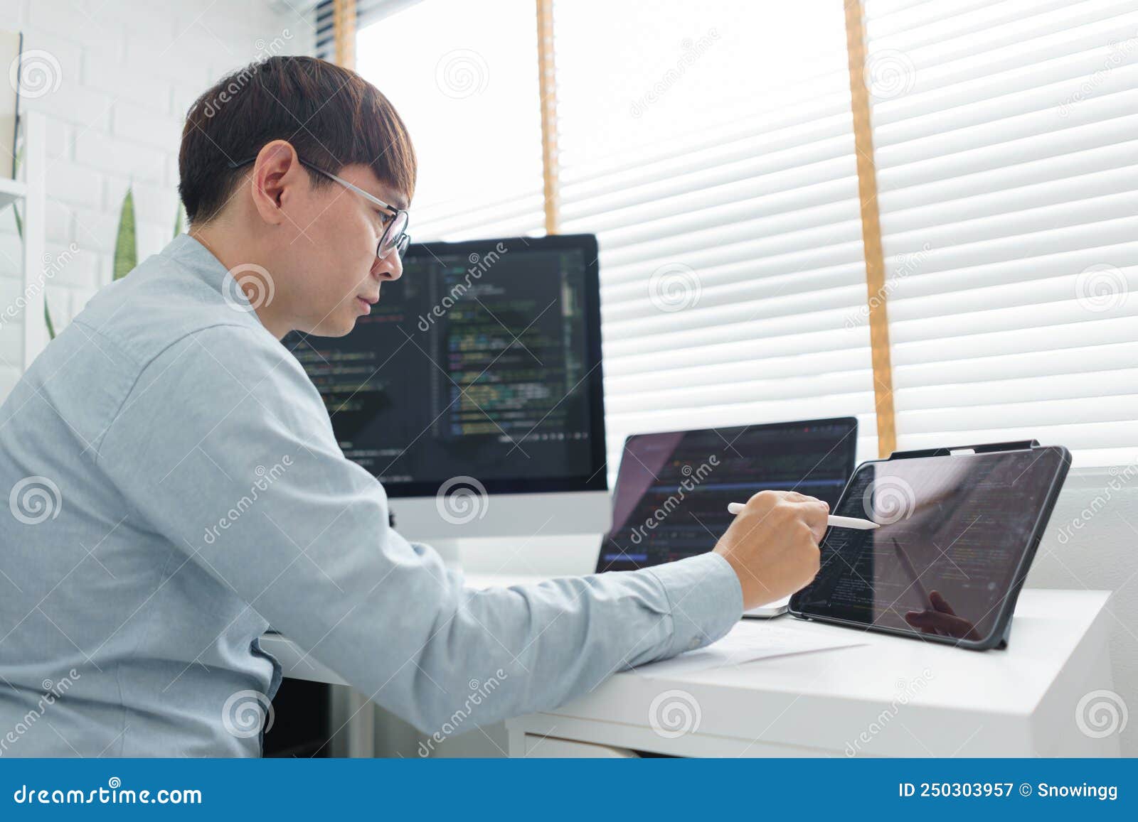 Software Development Concept, Male Programmer Point Data on Tablet To Checking Website ...