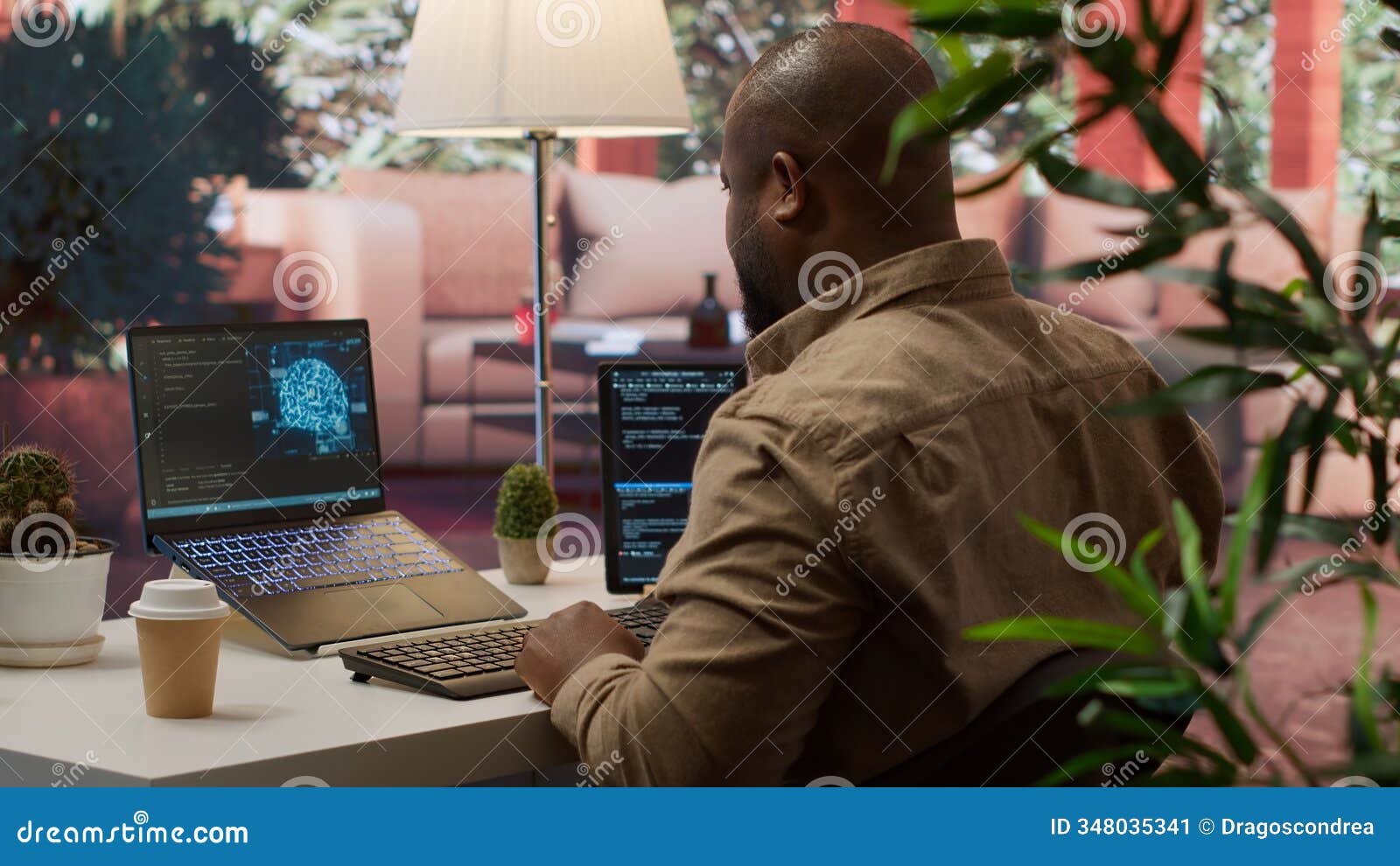 Software Engineer Coding on a Laptop Focusing on Deep Learning Stock ...