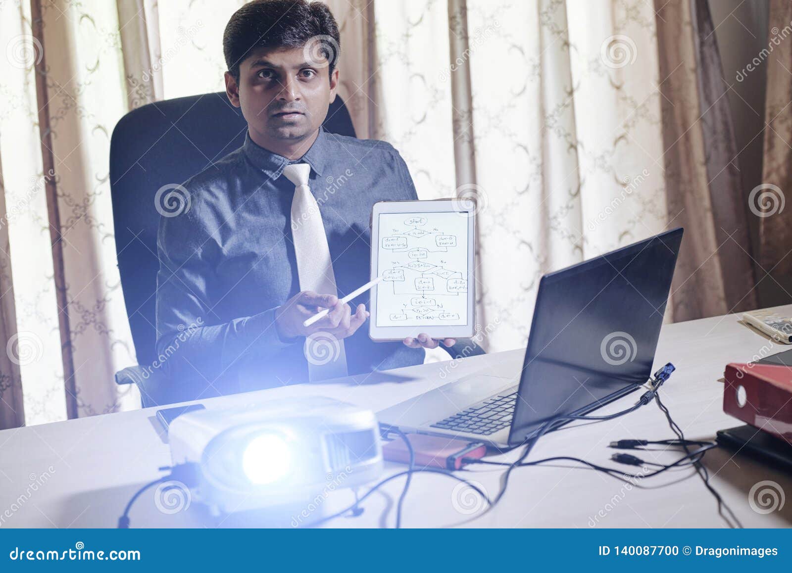 Software Engineer Explaining Flowchart Stock Photo - Image of desk ...