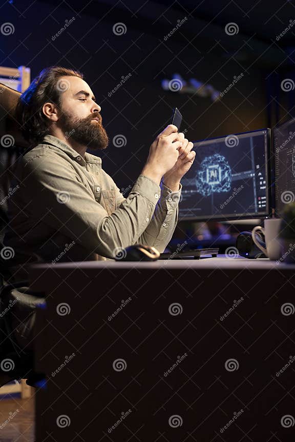 Software Engineer Inserting Disk into PC Containing AI Machine Learning ...