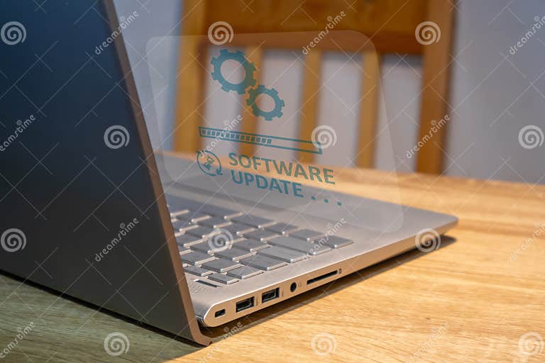 Software System Update Process Concept. a Laptop on the Table with ...