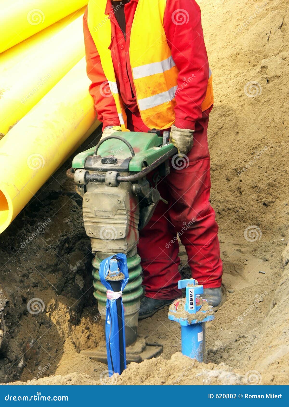 Soil compacting stock photo. Image of people, building - 620802