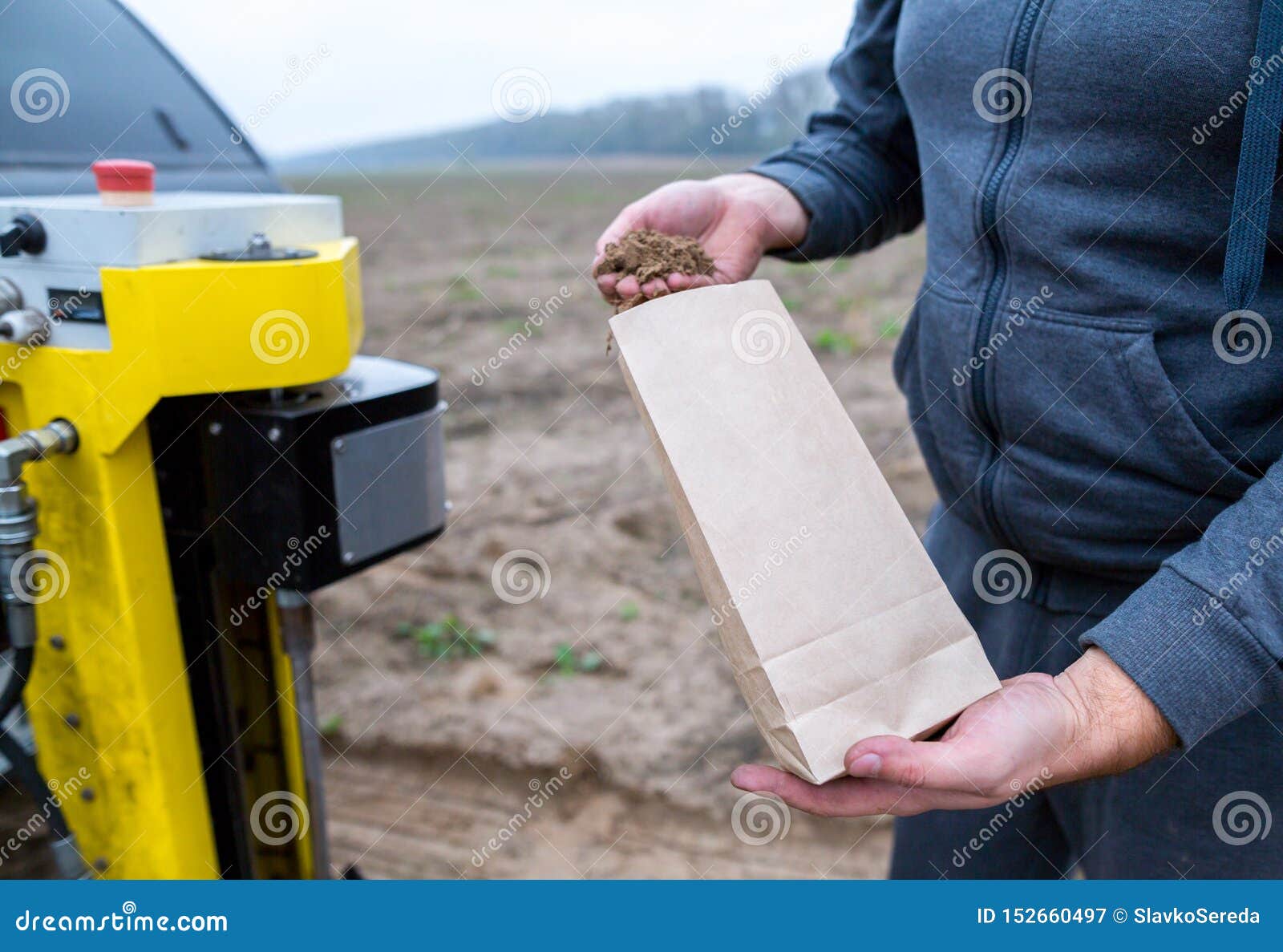 Soil Sampling. an Engineer Employee of a Research Laboratory Packs a ...