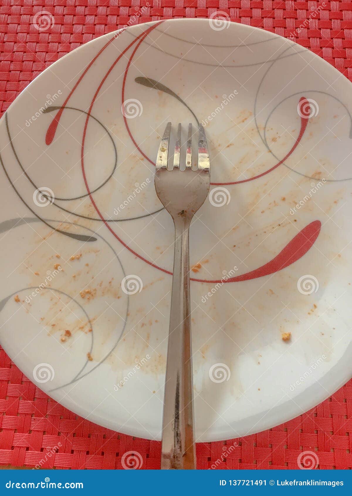 Soiled plate with fork stock image. Image of soiled - 137721491