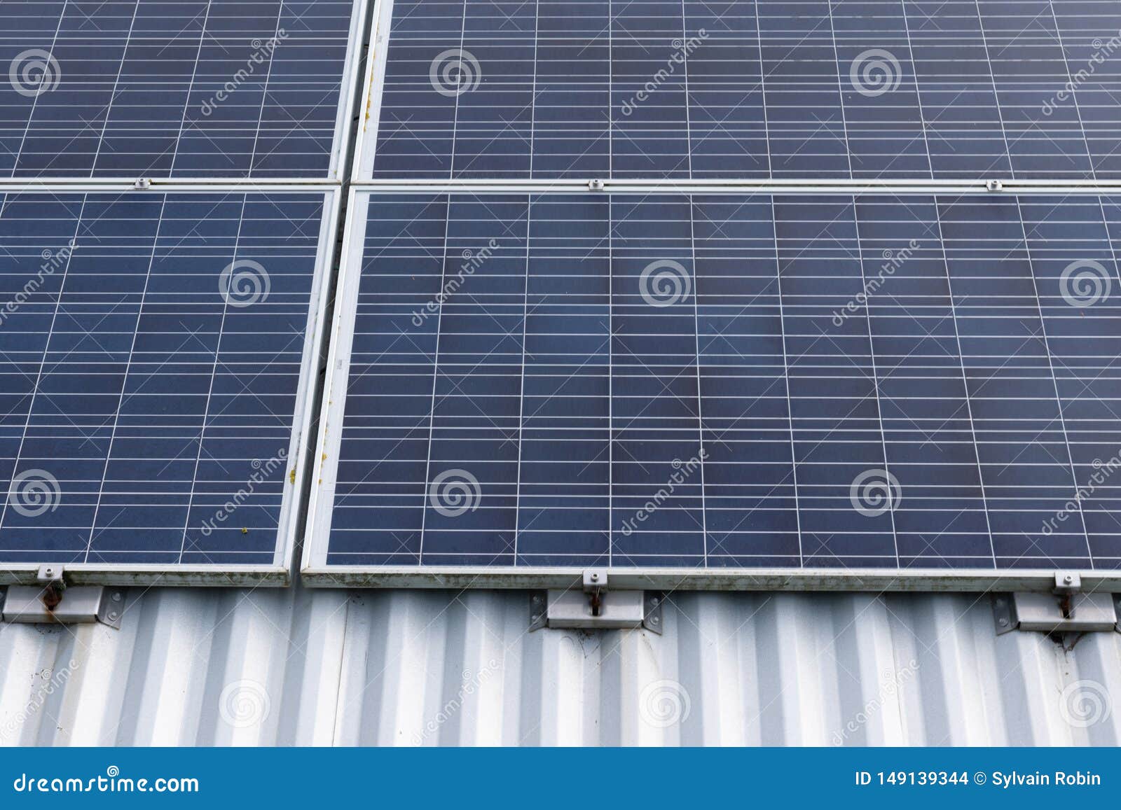 Solar Blue Panel on a Industrial Roof Stock Photo - Image of business ...