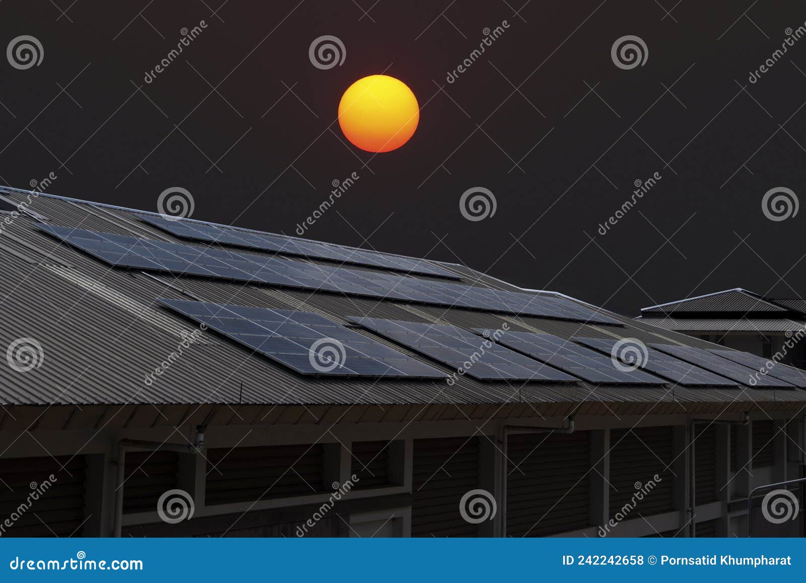 Solar Cell Panels on the Roof on Sunset Background Stock Photo - Image ...