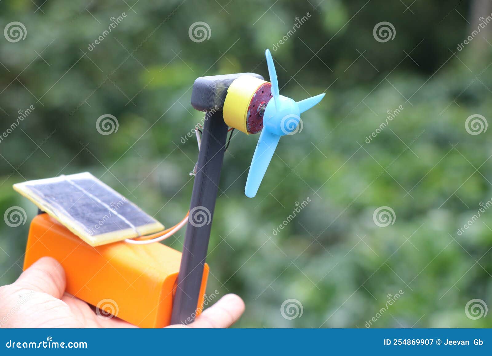 Solar Cell and Propeller Attached To a Small Dc Motor Makes a Small ...