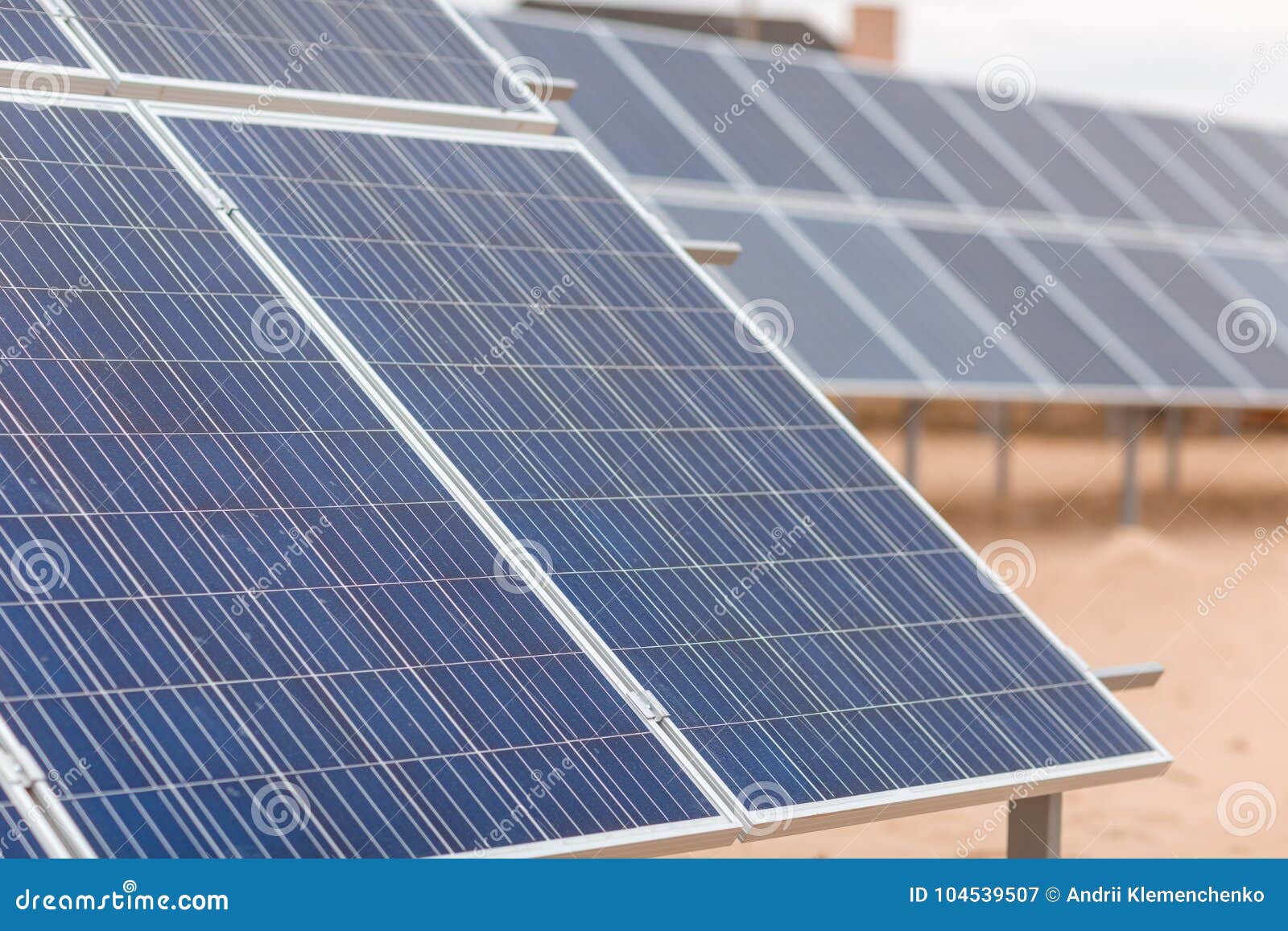 The Solar Cell Section on the Blurred Background of Other Solar Panels ...