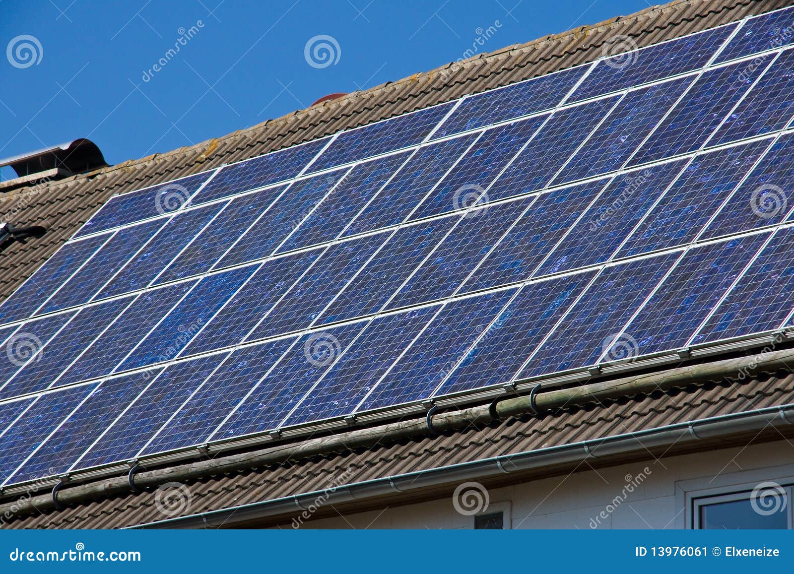 Solar cells on a roof stock image. Image of producer - 13976061