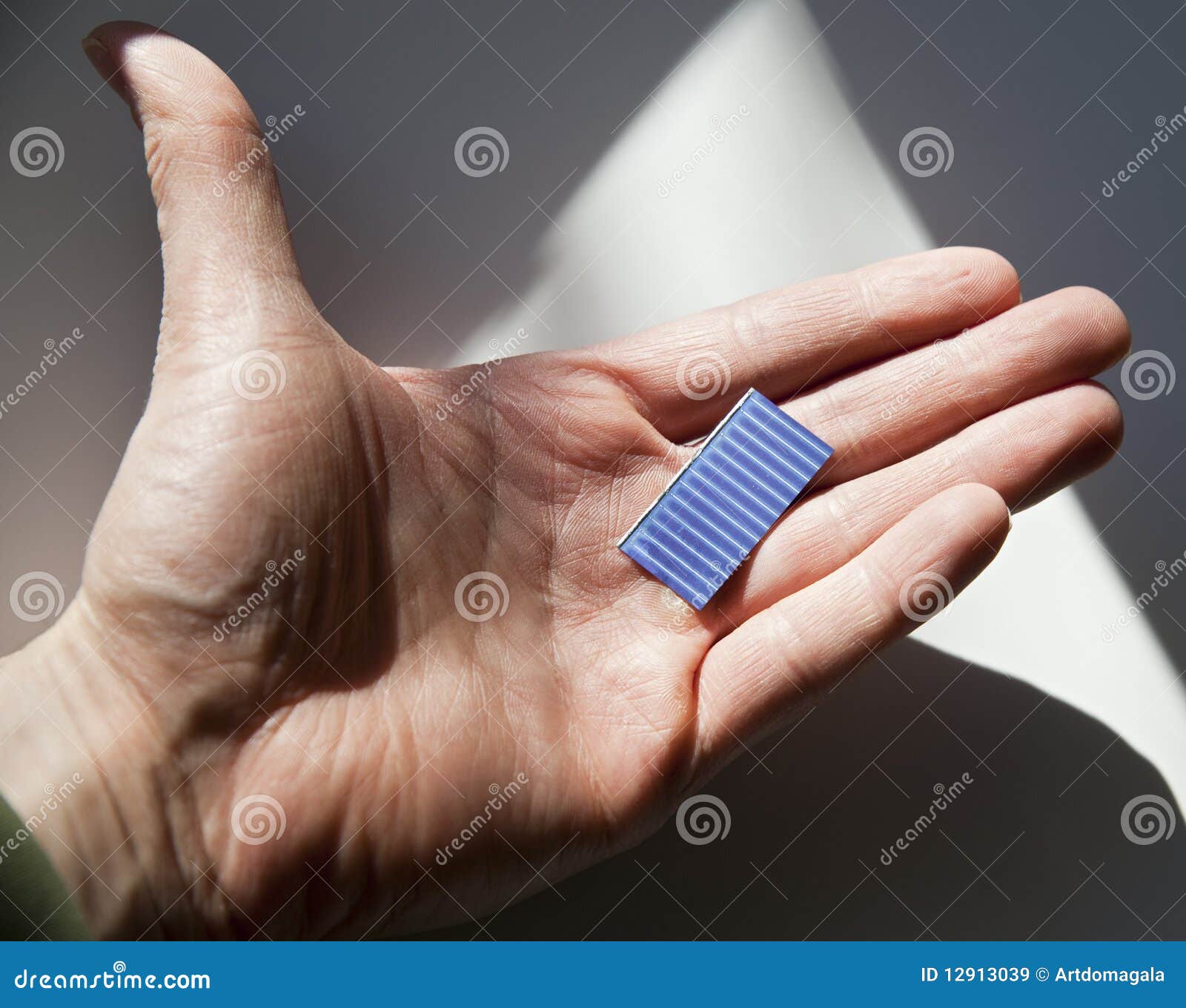 Solar chip in palm stock image. Image of chip, component - 12913039
