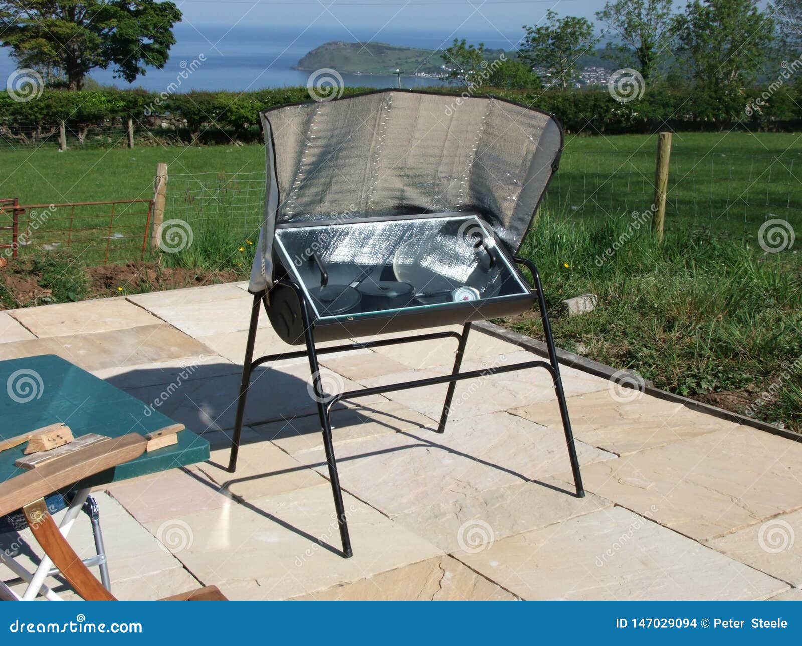Solar Cooking in a Converted Bbq Solar Oven Stock Photo - Image of ...