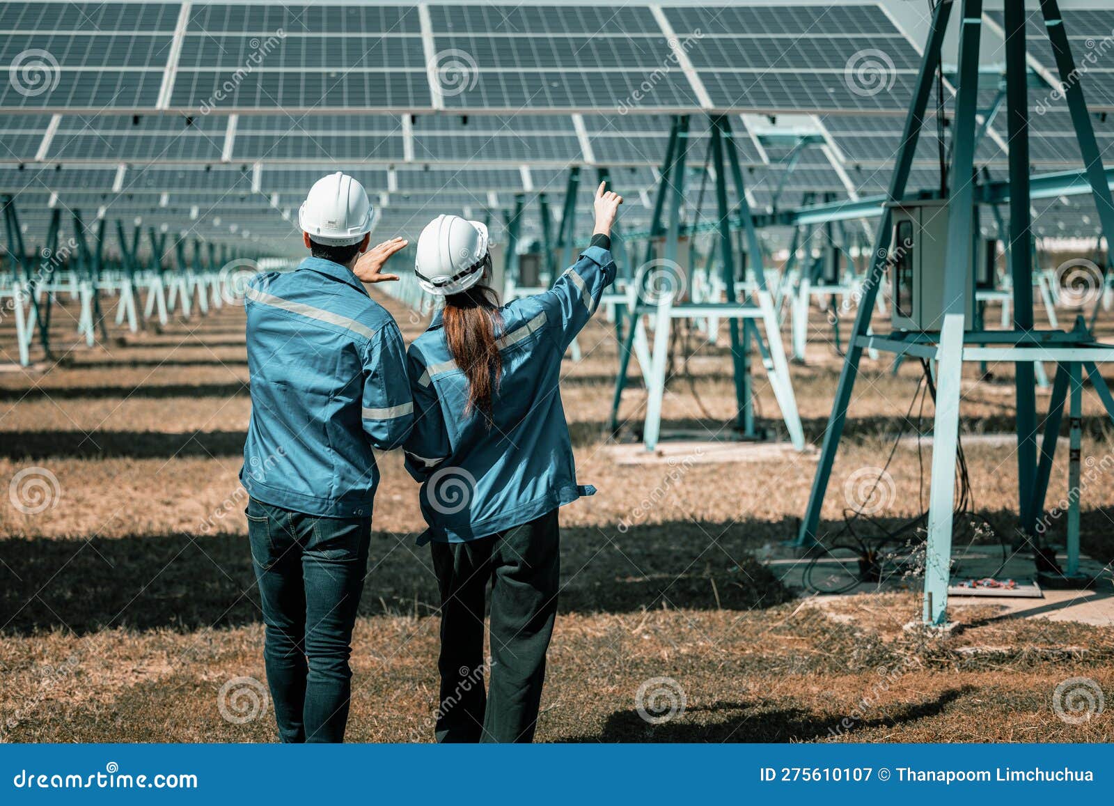 Solar Design Engineers Visually Inspect Photovoltaic Array Installation ...