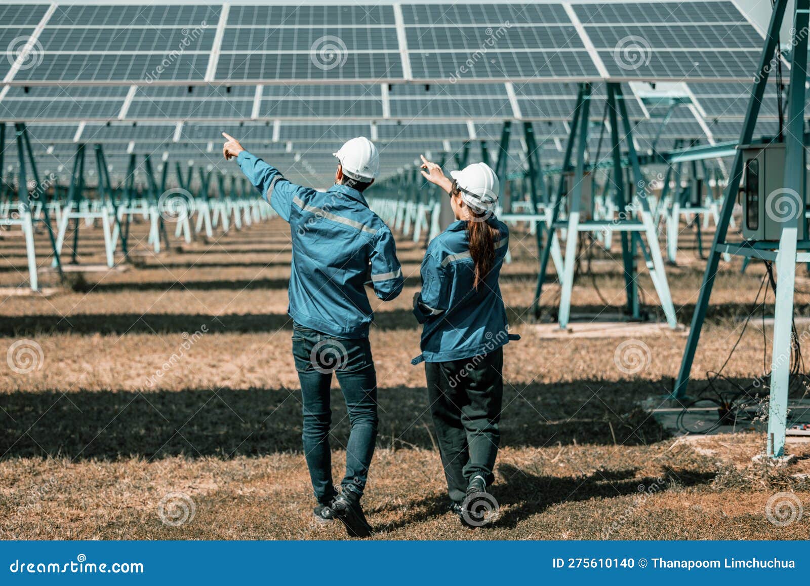 Solar Design Engineers Visually Inspect Photovoltaic Array Installation ...