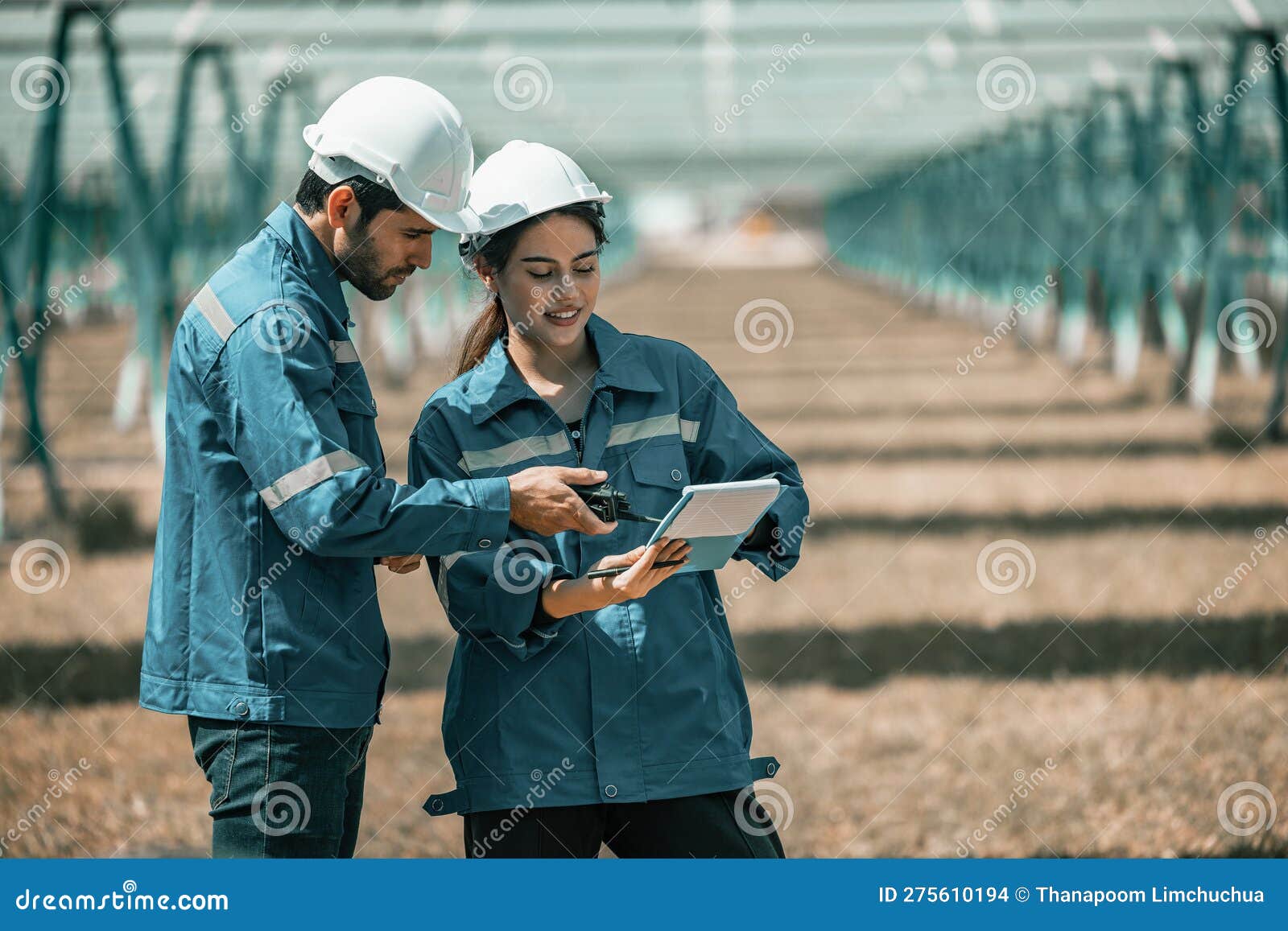 Solar Design Engineers Visually Inspect Photovoltaic Array Installation ...