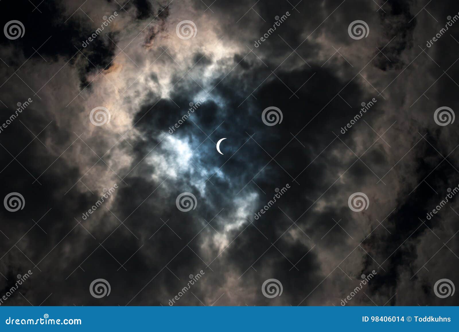 Solar Eclipse with Clouds stock photo. Image of black - 98406014