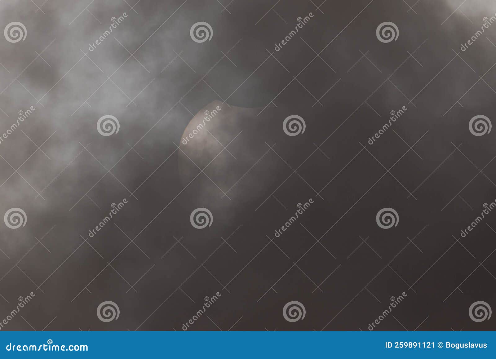 Solar Eclipse on a Cloudy Day. Stock Image - Image of layer, sunspot: 259891121