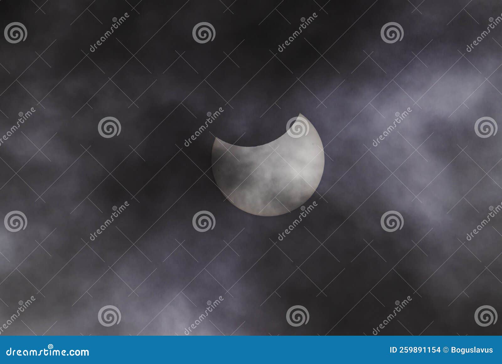 Solar Eclipse on a Cloudy Day. Stock Photo - Image of layer, phenomenon: 259891154