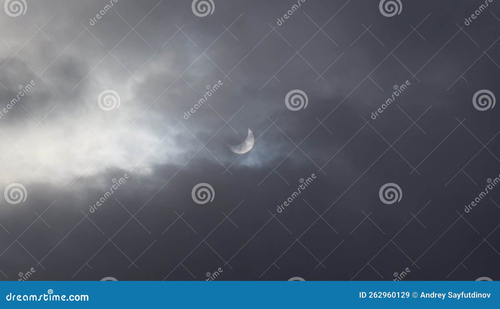 A Solar Eclipse in Cloudy Weather through a Cloud. Partial Solar Eclipse. Stock Video - Video of ...