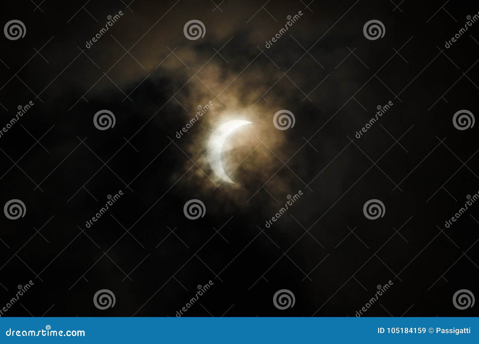 Solar Eclipse with Dramatic Clouds Stock Image - Image of cloud ...