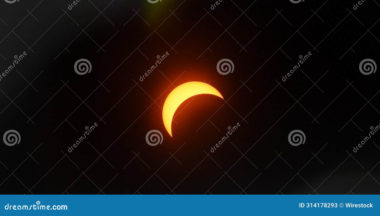 Solar Eclipse with a Glowing Crescent in the Dark Sky Stock Image ...