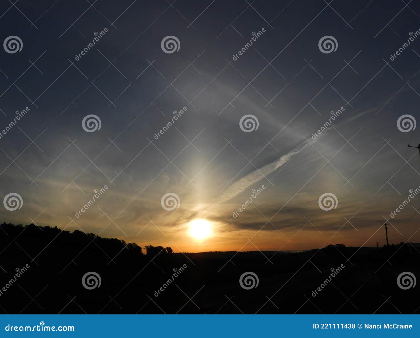 Solar Eclipse Morning Showing Sun Dog and Sun Pillar Stock Photo ...
