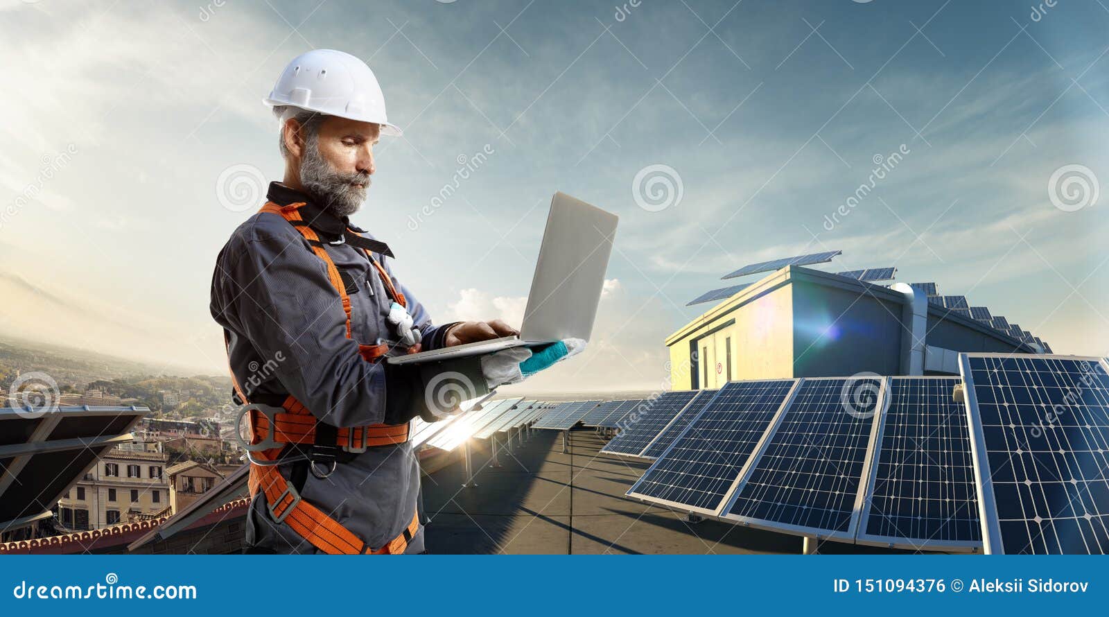 Solar Energy Engineer Using Laptop for Check Station in Roof Stock ...